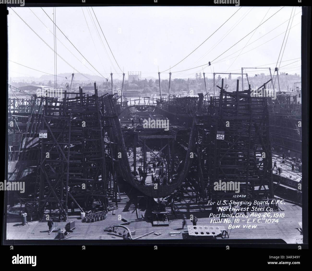 This photograph shows a bow view of hull no. 18, under construction at ...