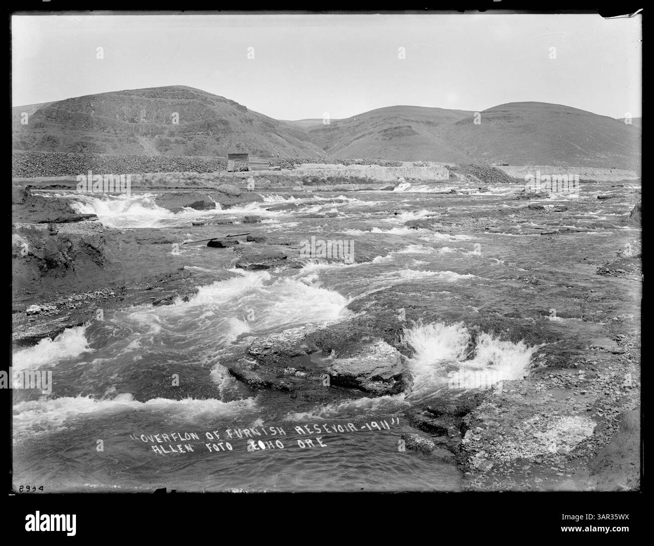 This photograph depicts the overflow of Furnish Reservoir, showcasing ...