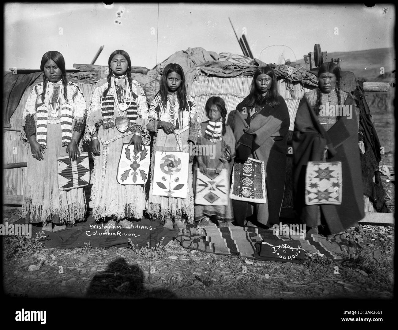 This Lee Moorhouse photograph features a group of six Wishram tribal ...