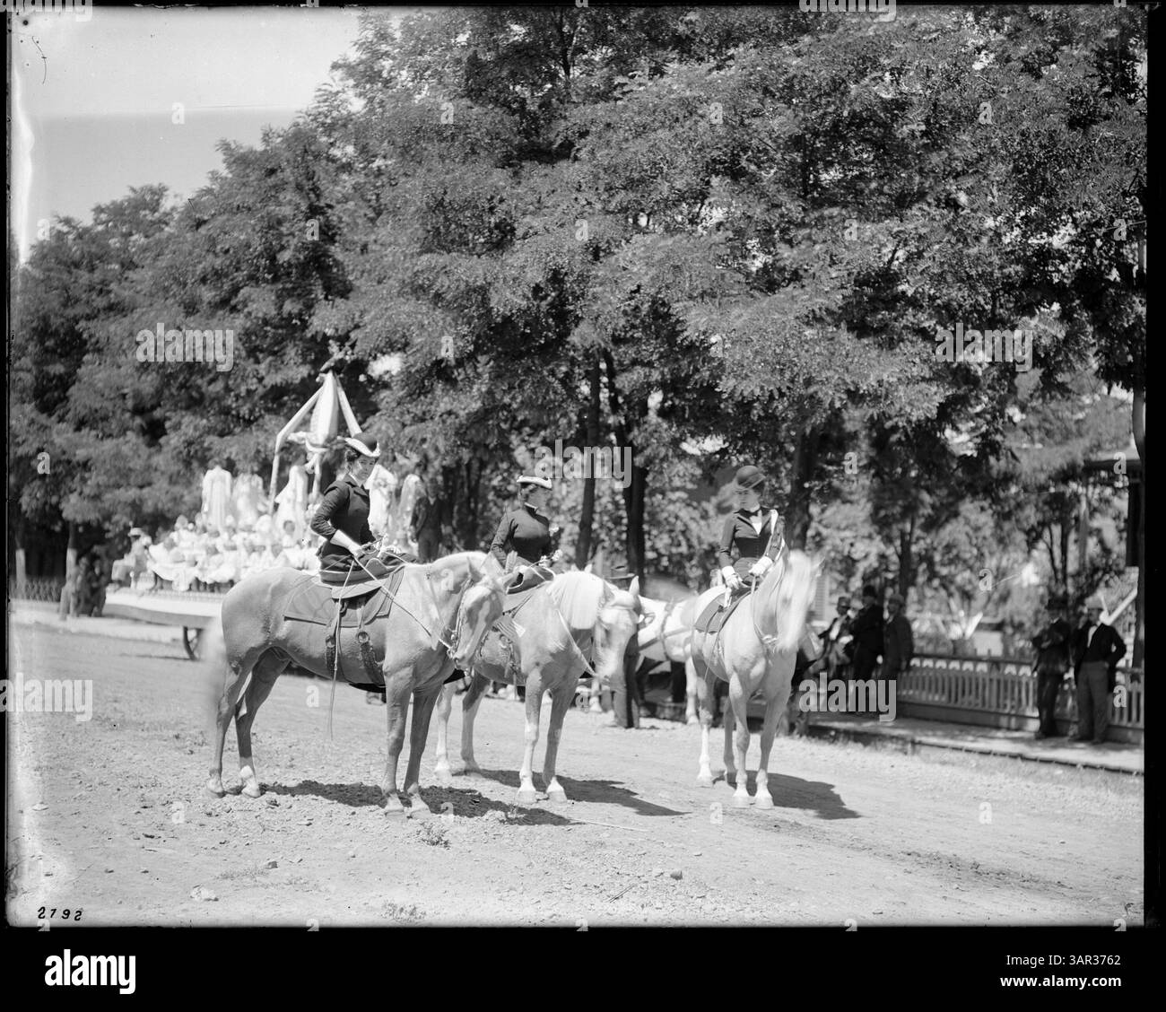Photograph by Lee Moorhouse of women riding side-saddle. The image ...