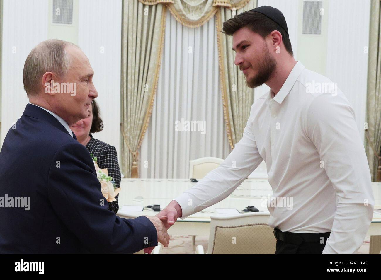 Russian President Vladimir Putin, left, and Alexander Troufanov, who ...