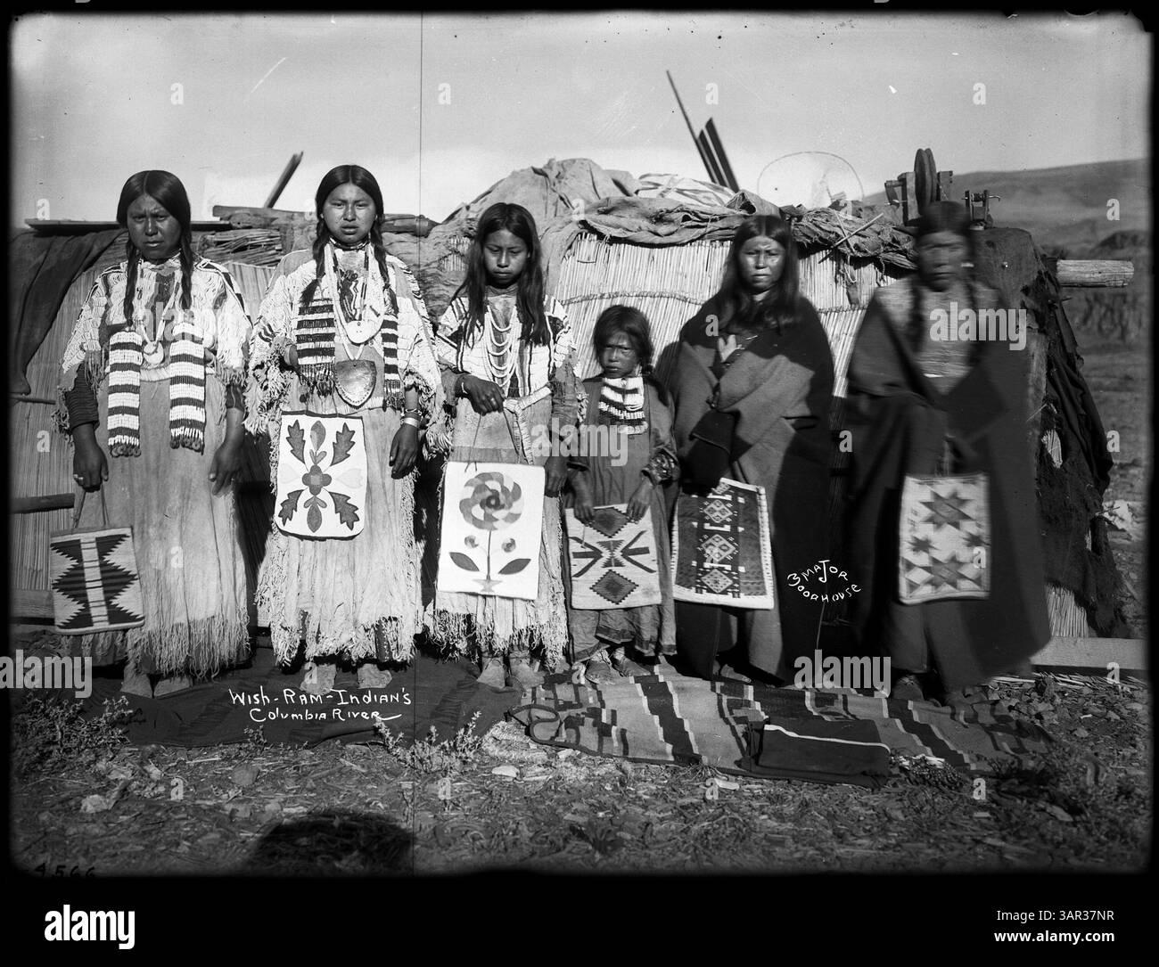 This photograph by Lee Moorhouse depicts a group of six Wishram tribal ...