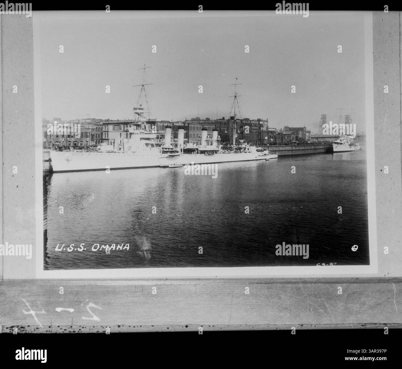 Photograph of the USS Omaha docked, capturing the ship in port during ...