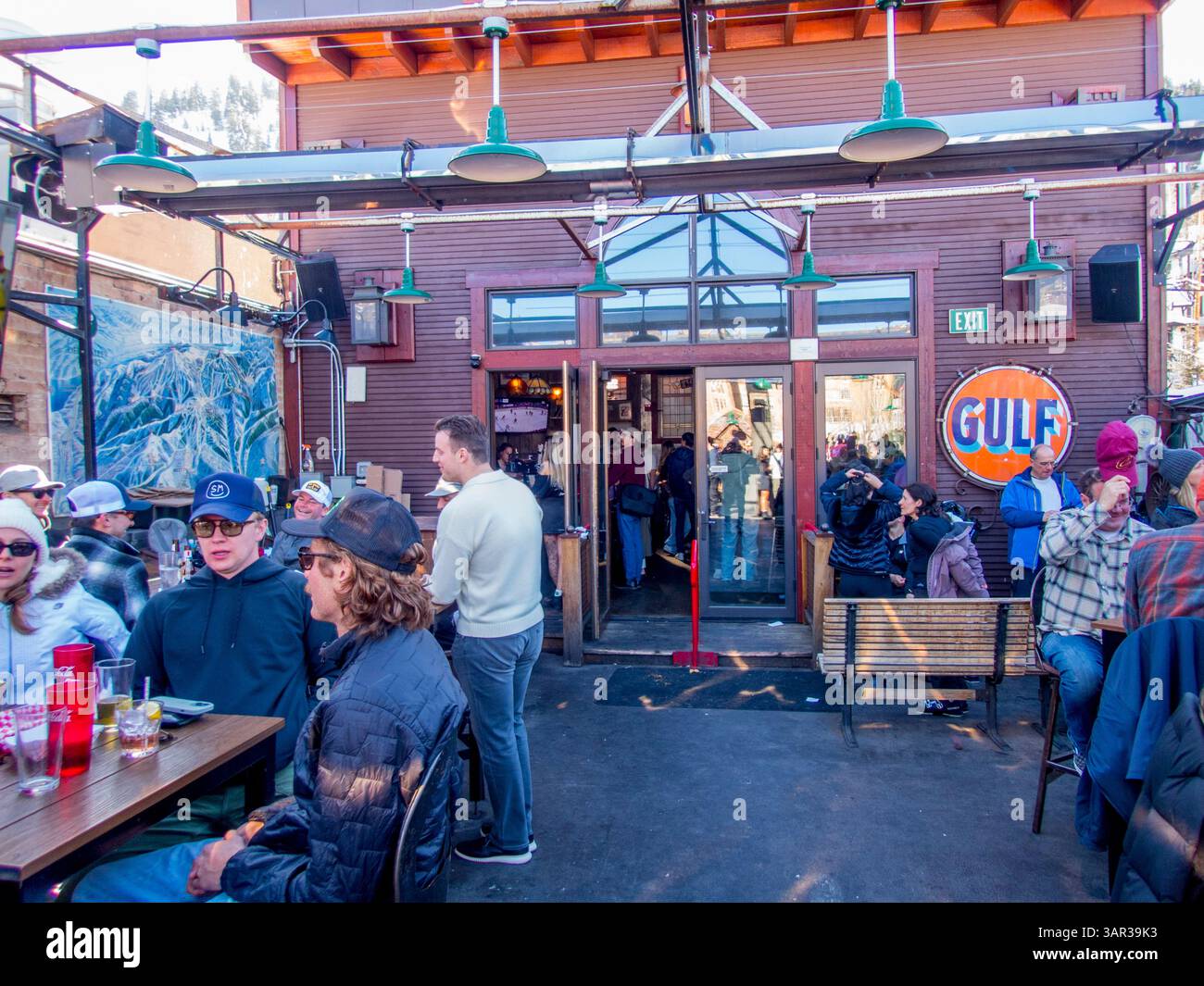 People enjoying the rooftop deck at the No Name Saloon & Annex Burger ...