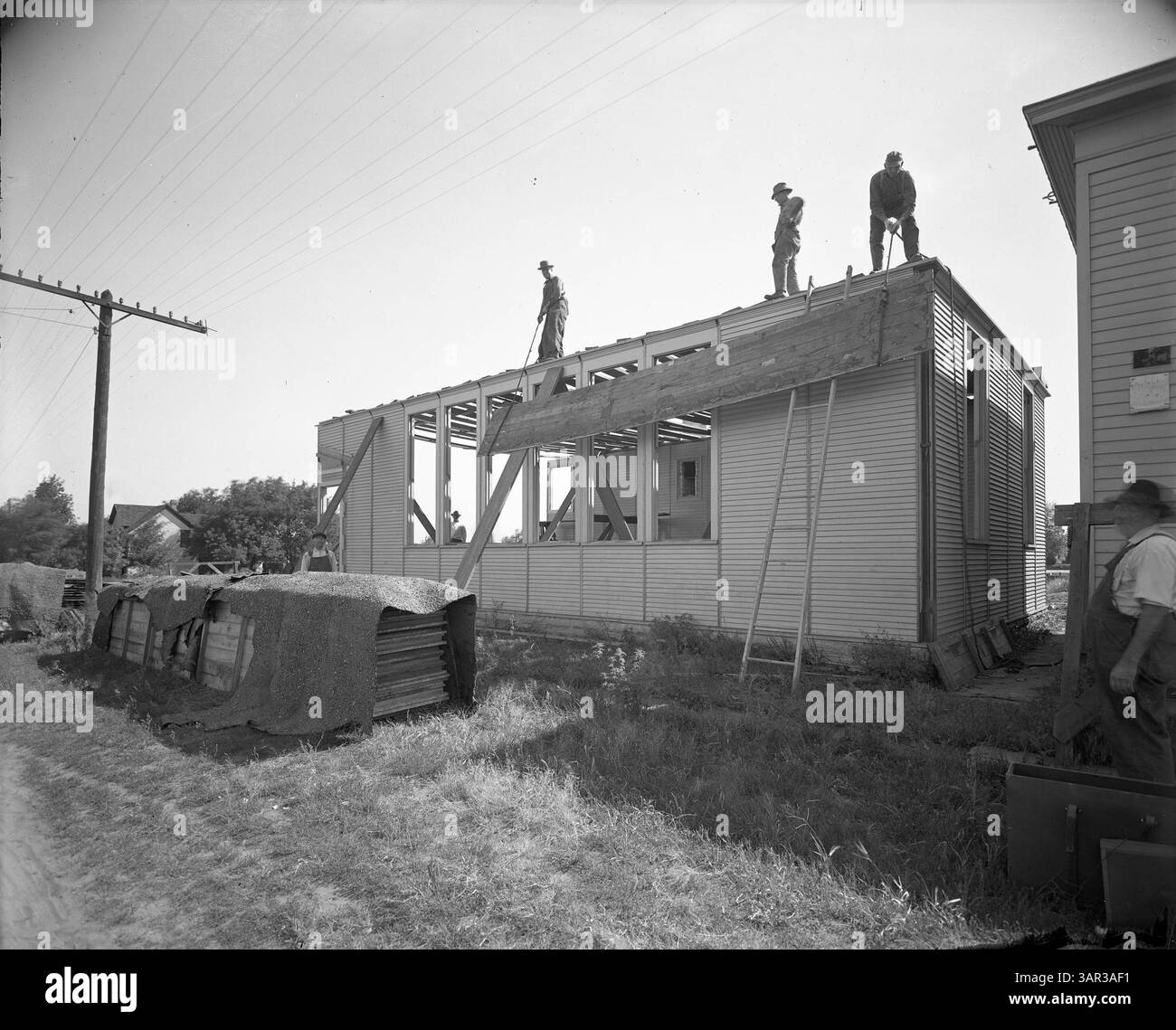 The dismantling of the portable classrooms at Standish School is shown ...