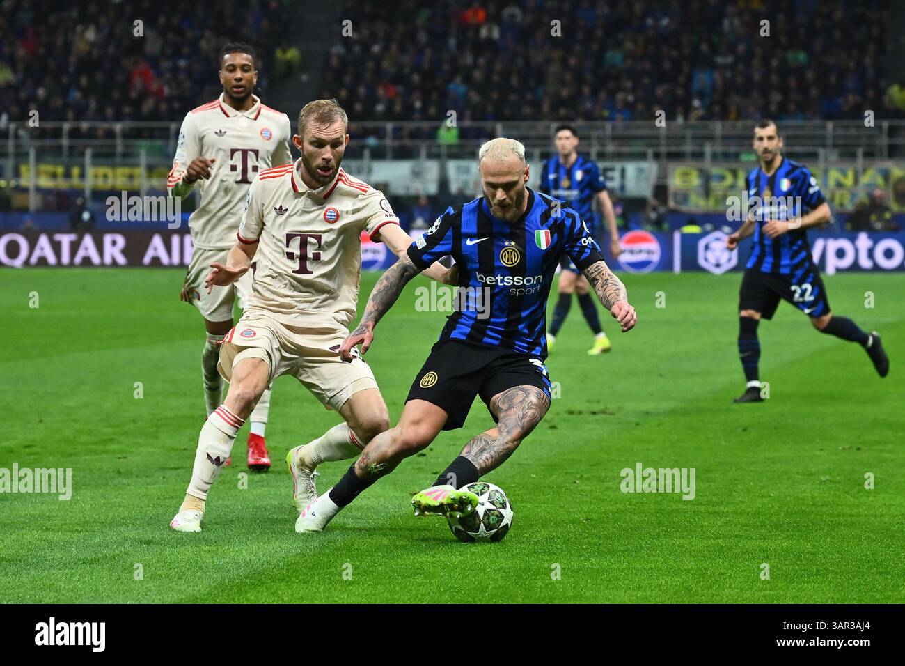 Milan, Italy. 17th Apr, 2025. Konrad Laimer of F.C. Bayern Munchen and Federico Dimarco of F.C ...