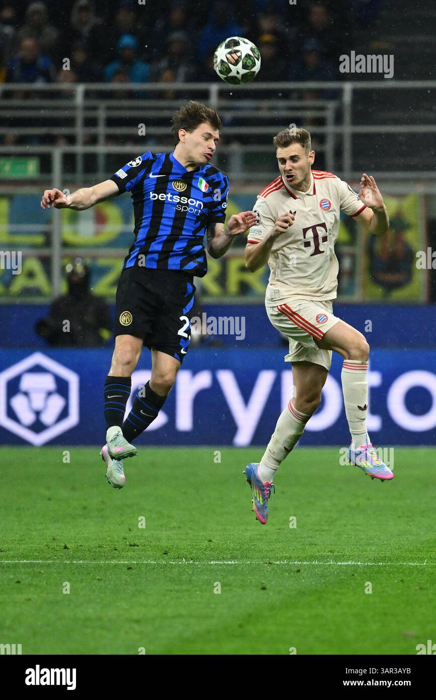 Milan, Italy. 17th Apr, 2025. Nicolo Barella of F.C. Inter and Josip Stanisic of F.C. Bayern ...