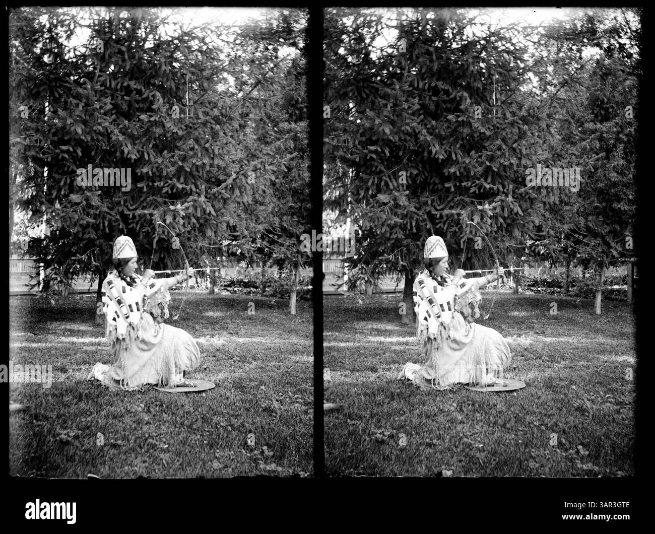 Lee Moorhouse's photograph captures a tribal woman in regalia shooting ...