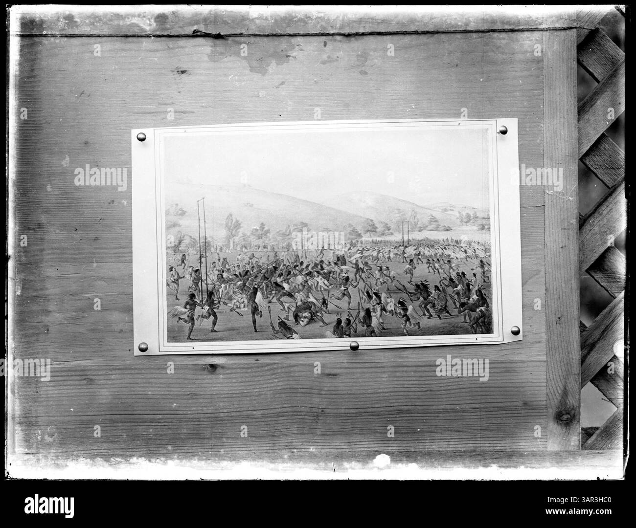 This copy negative depicts a tribal battle, capturing a historic moment ...