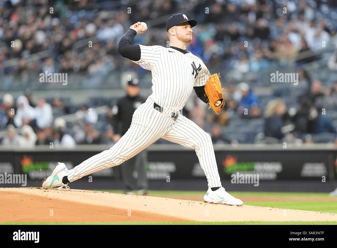 BRONX, NY - APRIL 16: New York Yankees Pitcher Clarke Schmidt delivers ...