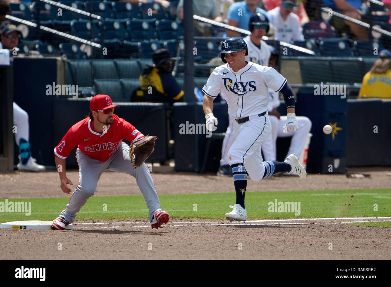 Tampa Bay Rays Jake Mangum (28) runs up the base line as first baseman ...