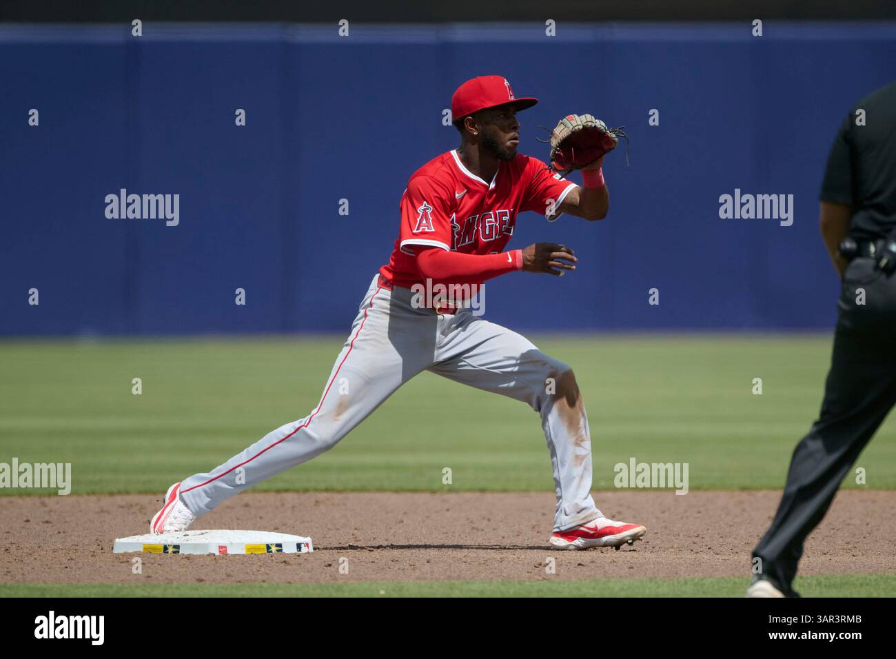 Los Angeles Angels shortstop Tim Anderson (77) turns a double play in ...
