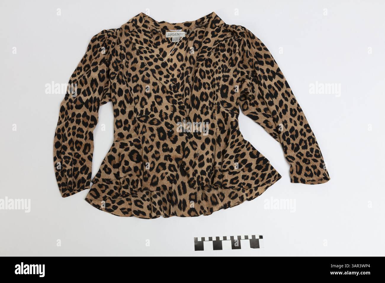 This leopard print skirt suit by Argenti was worn by John Chaney, known ...