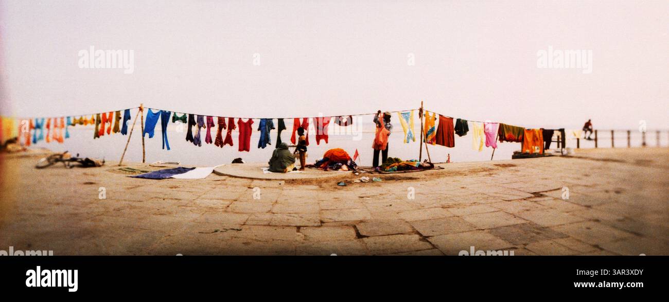 Panoramic image of hanging clothes out to dry after washing them in the ...