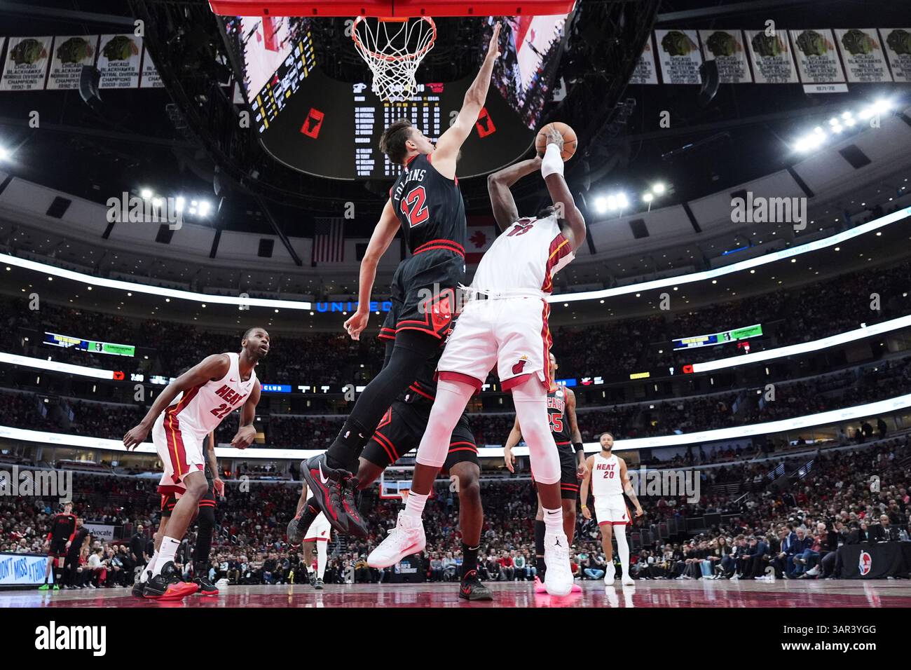 Miami Heat center Bam Adebayo, right, shoots against Chicago Bulls ...