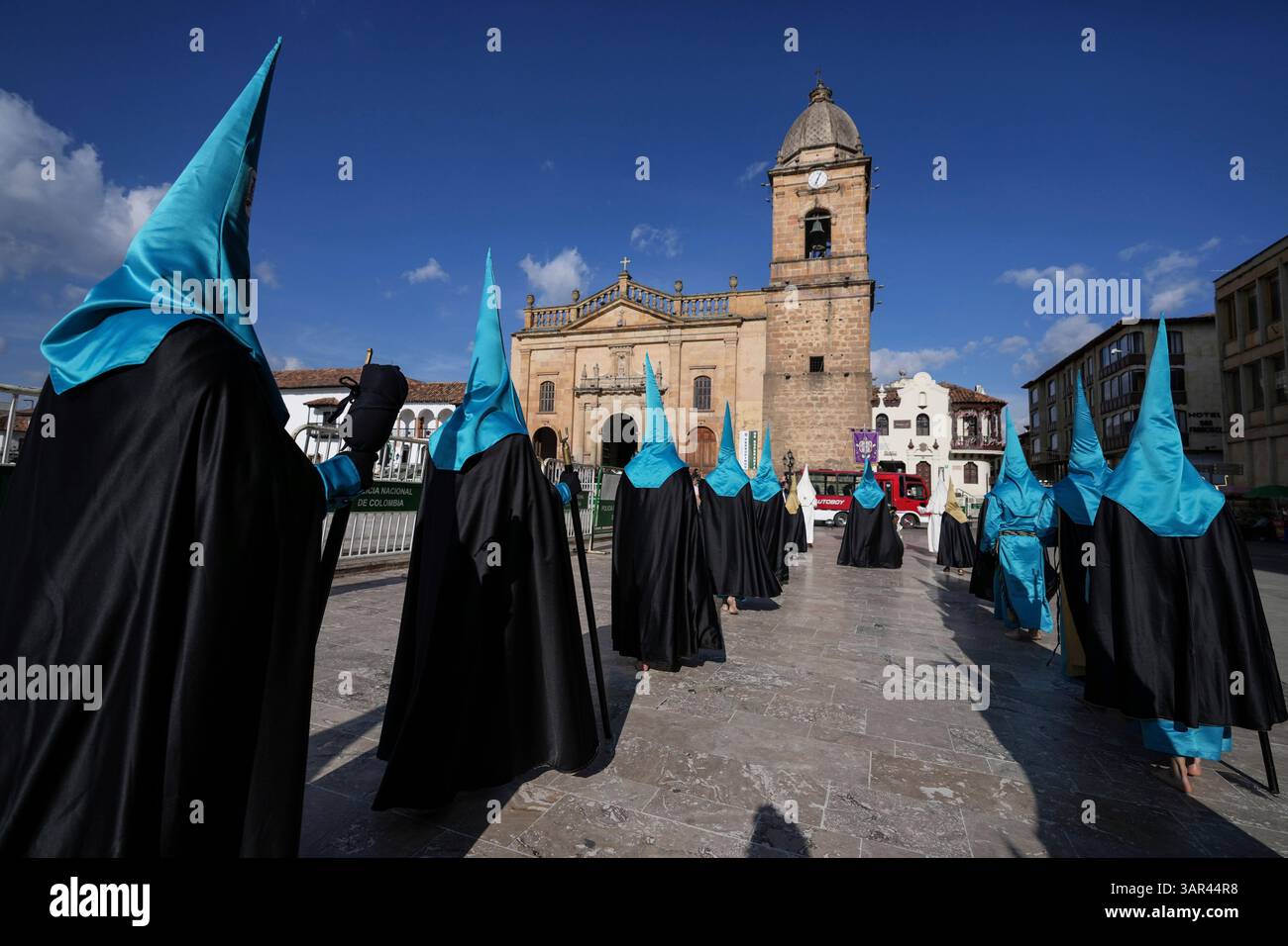 Nazarenes participate in a Holy Week procession in Tunja, Colombia ...