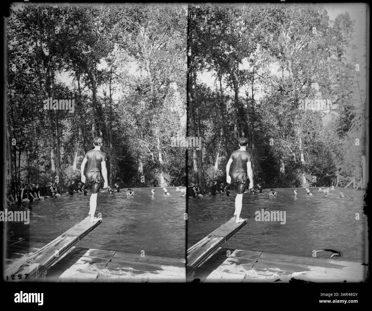 Photograph of people swimming at Bingham Springs pool, captured in ...