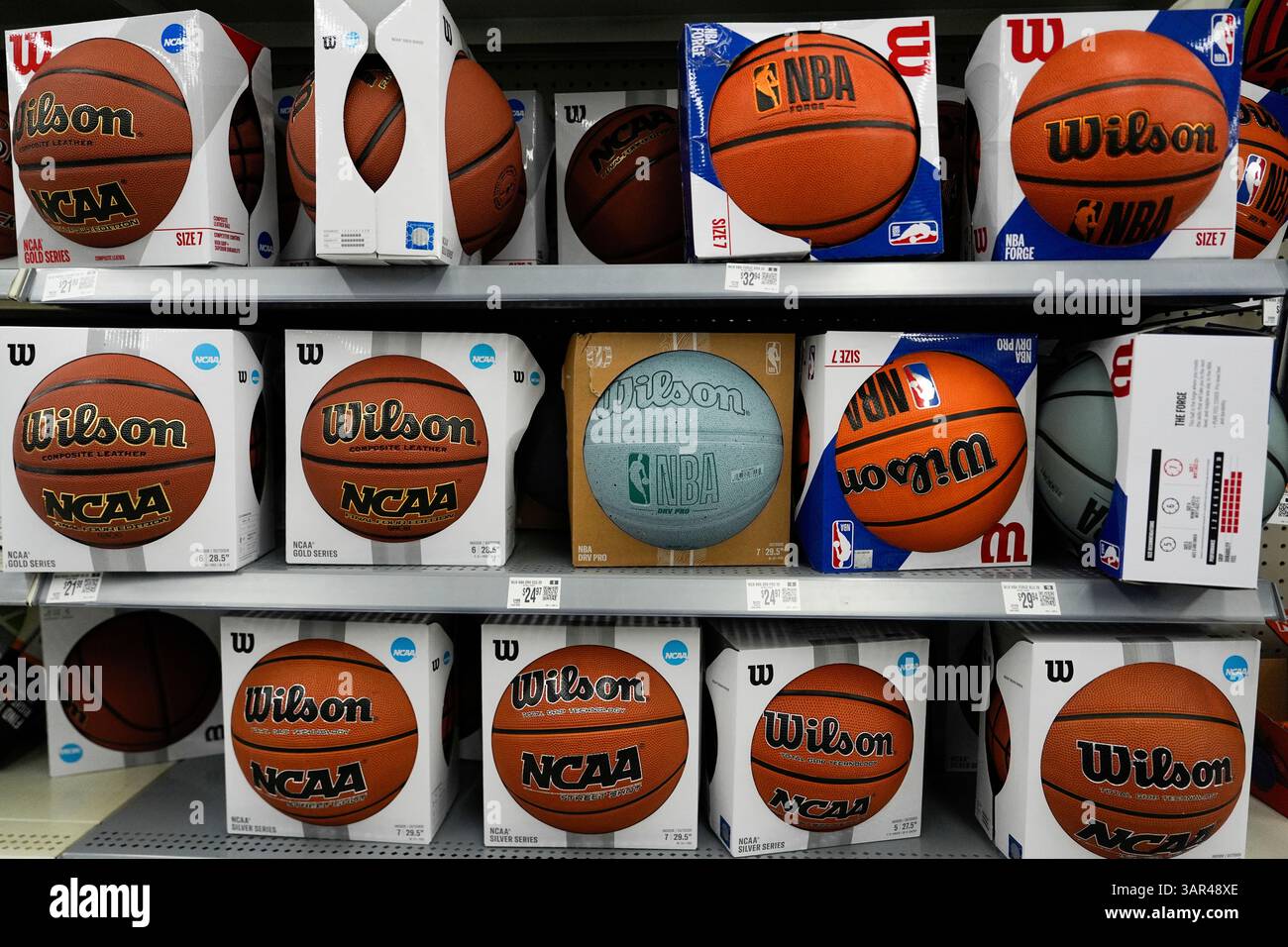 Basketballs are displayed on shelves at a Walmart, Wednesday, April 16 ...