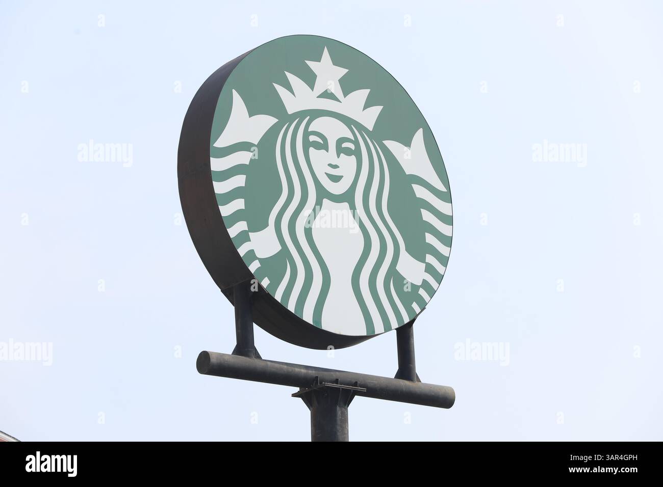 Starbucks Coffee logo or sign on the street Stock Photo - Alamy