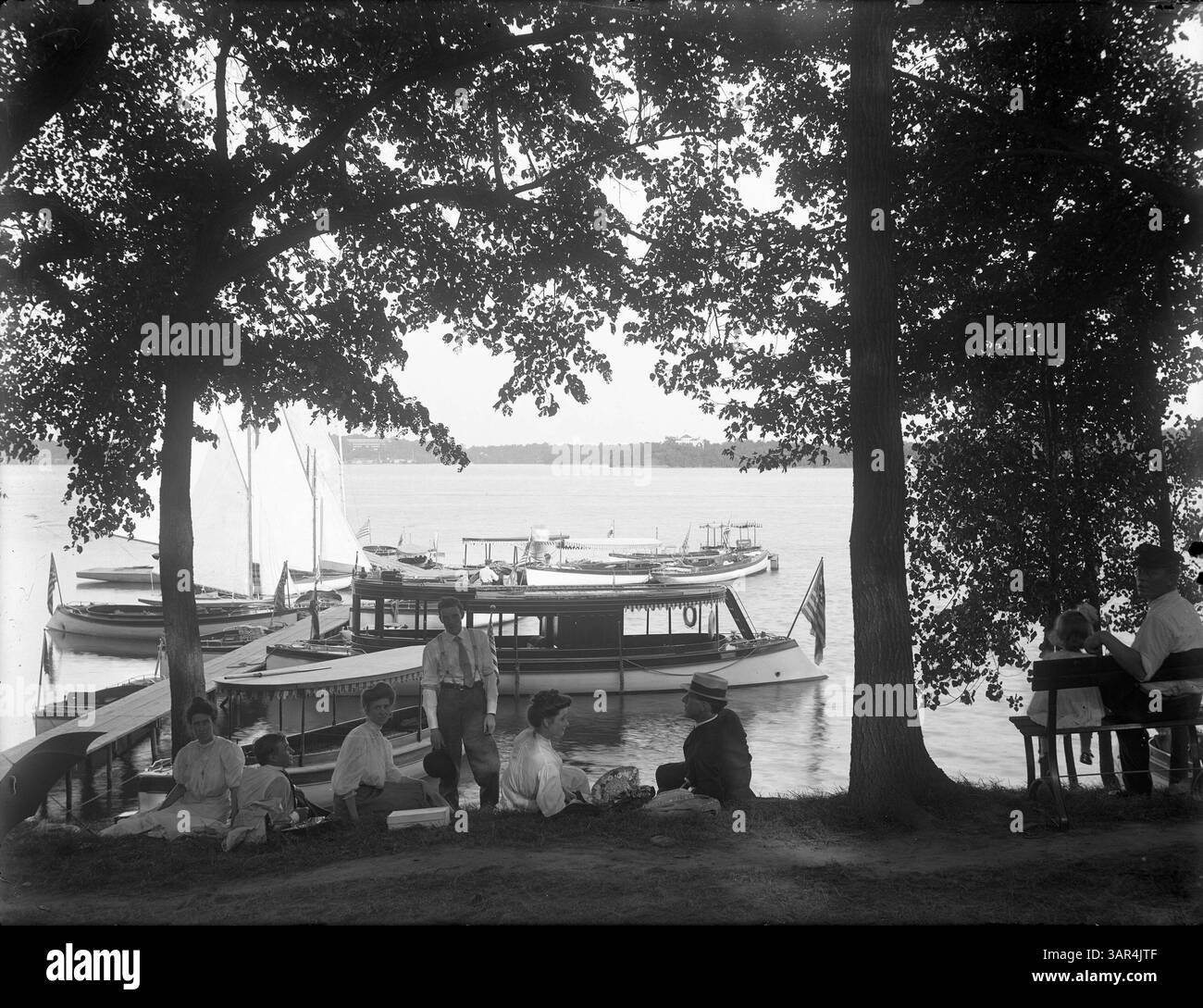 A relaxing scene at Big Island on Lake Minnetonka shows several young ...