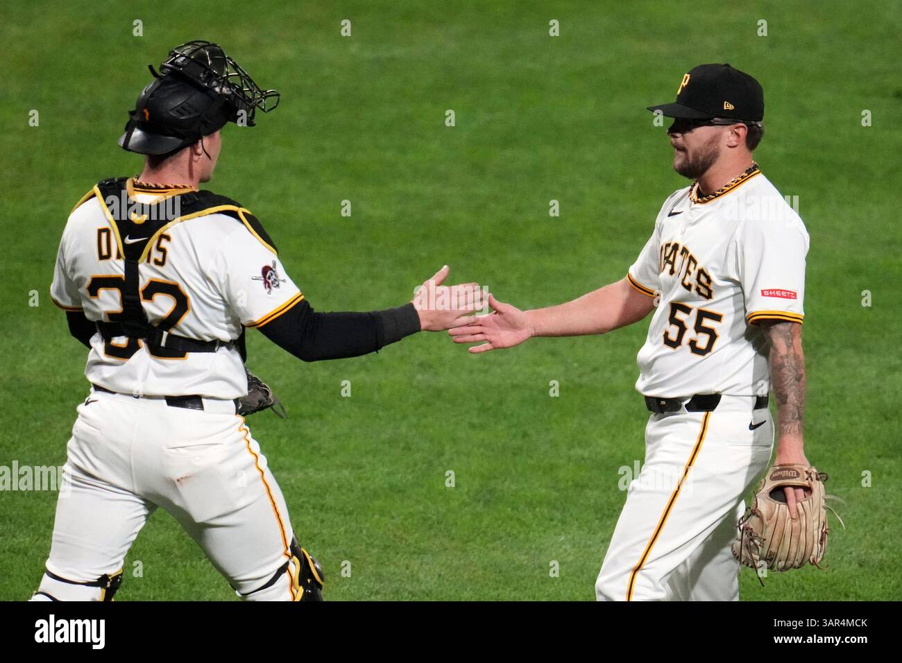 Pittsburgh Pirates pitcher Chase Shugart (55) and catcher Henry Davis ...