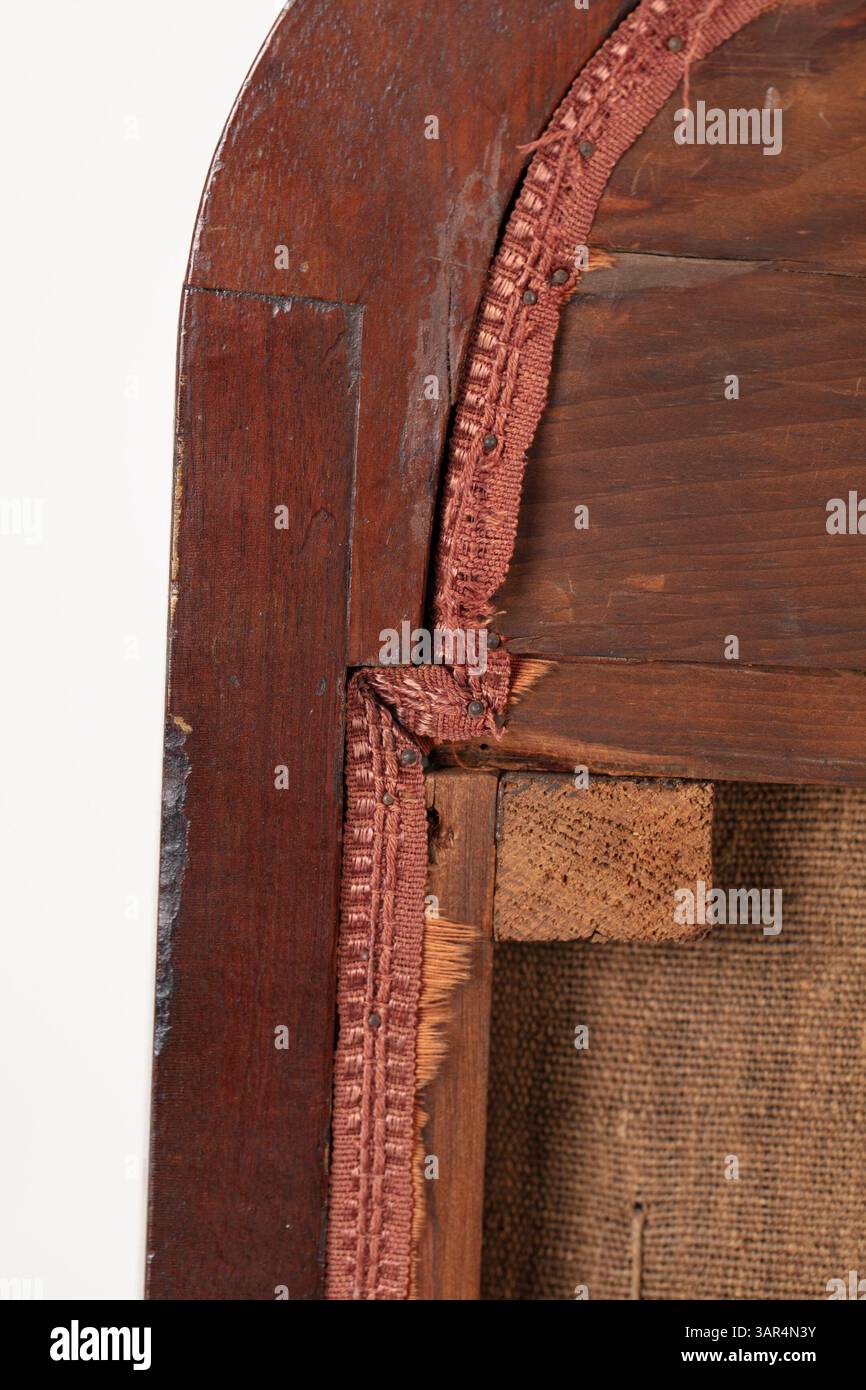 High-backed priest's chair with a red velvet upholstered seat and back ...