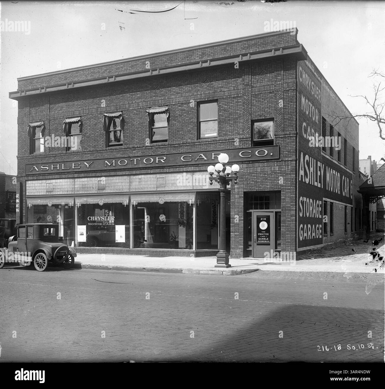 Ashley Motor Car Company, a Chrysler dealer, shown with their office ...