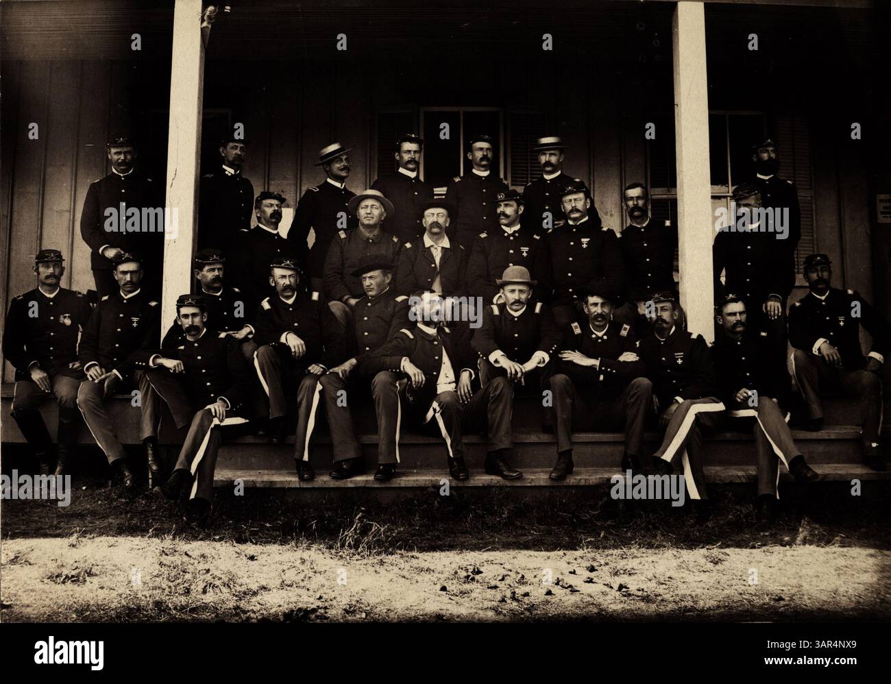 This photograph by Frazier A. Boutelle captures cavalry officers seated ...