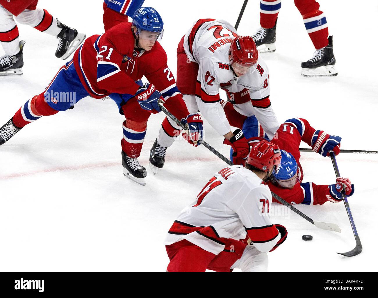 Montreal Canadiens' Brendan Gallagher (11) attempts to pass the puck ...