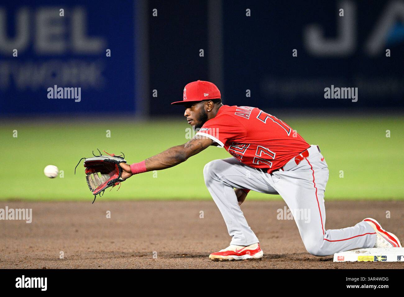 Los Angeles Angels shortstop Tim Anderson (77) catches a throw during ...