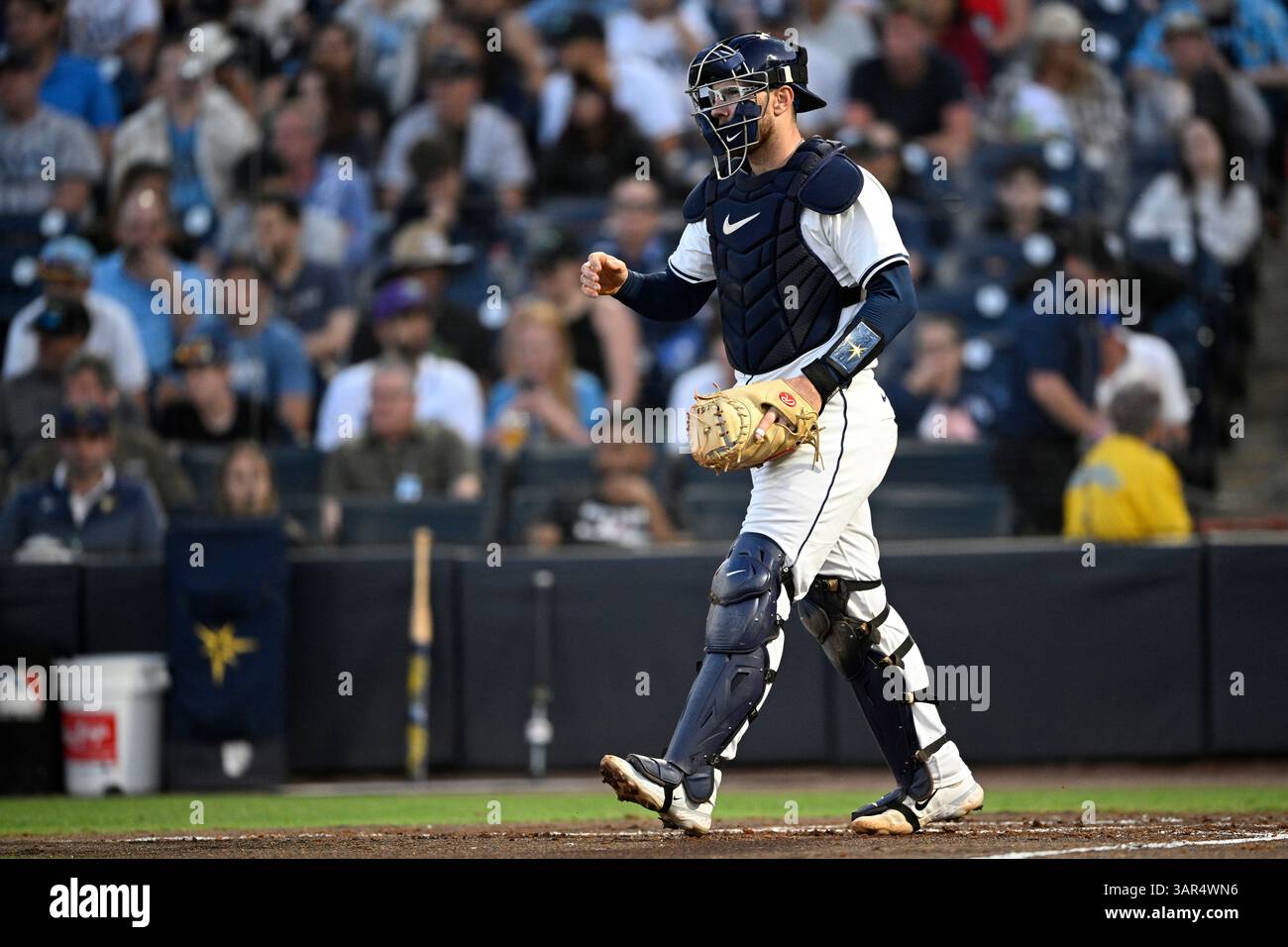 Tampa Bay Rays catcher Danny Jansen heads to the pitching mound during ...