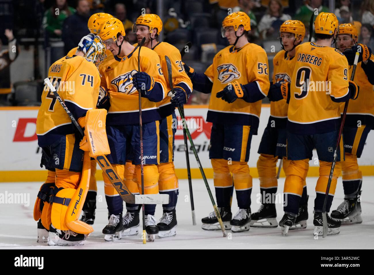 Nashville Predators goaltender Juuse Saros (74) is congratulated by ...