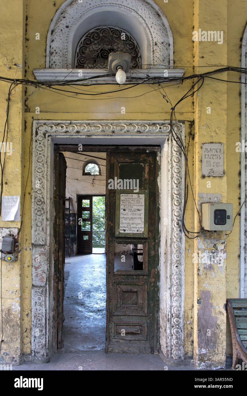 Entrance to an abandoned cable car station, mining town of Chiatura ...