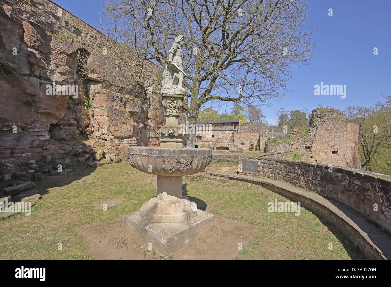 Fountain with knight and coat of arms in the inner courtyard of ...