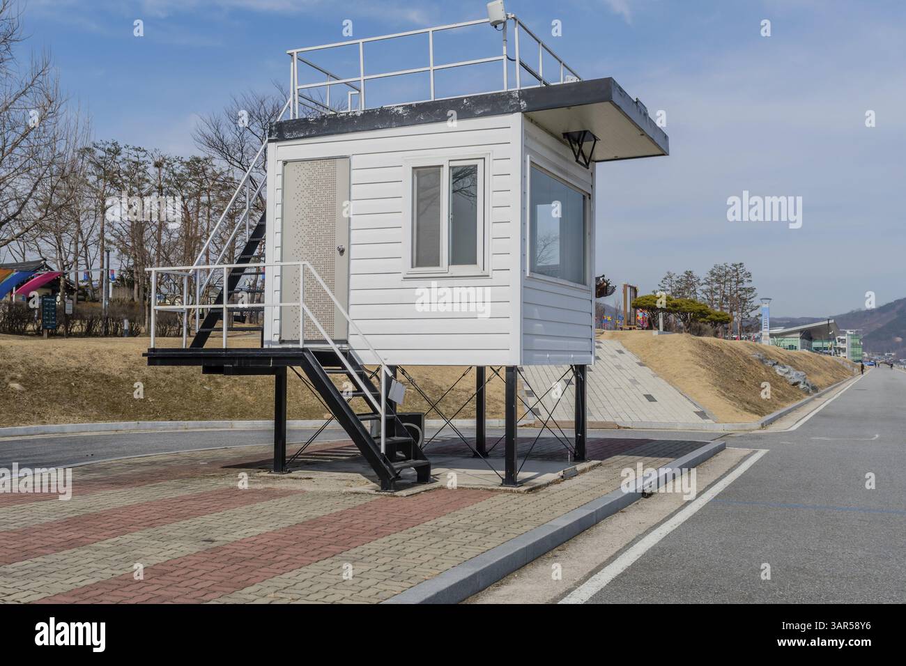 Chungju, South Korea. Feb. 24, 2021: Unmanned guard tower beside paved ...