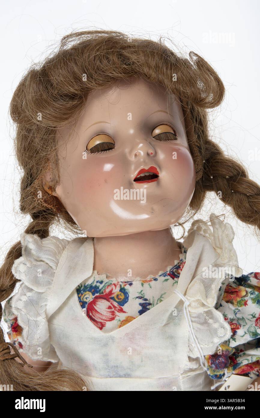 A composite doll featuring bangs and braids, with movable arms, legs ...