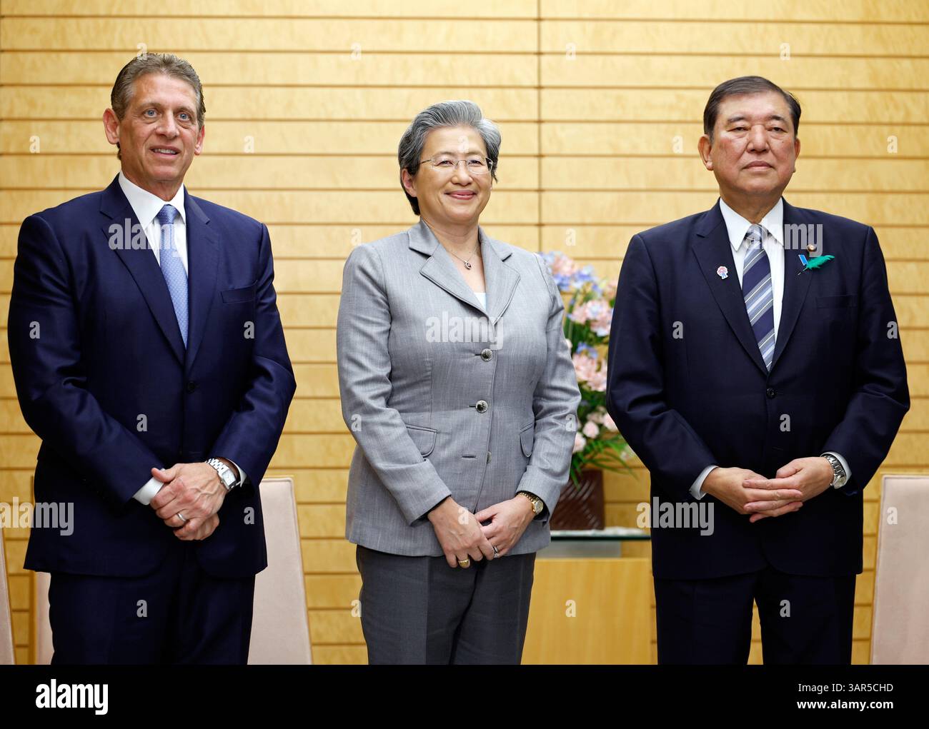 Japanese Prime Minister Shigeru Ishiba, right, poses with AMD Chair and ...