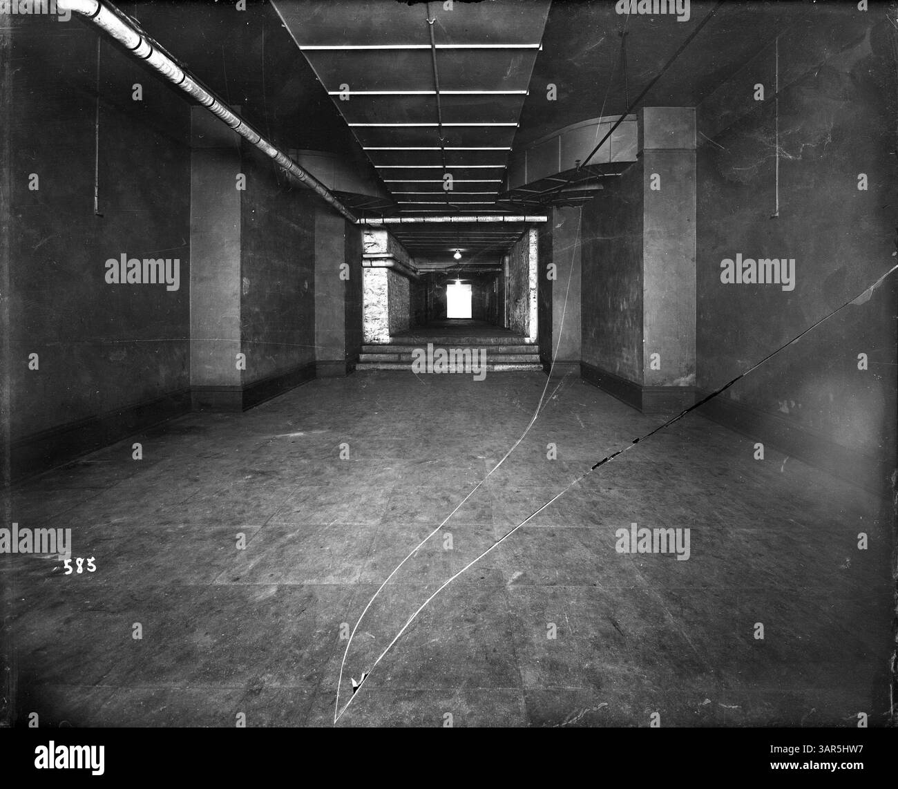 Image of the dark basement corridor and stairs at Webster School ...
