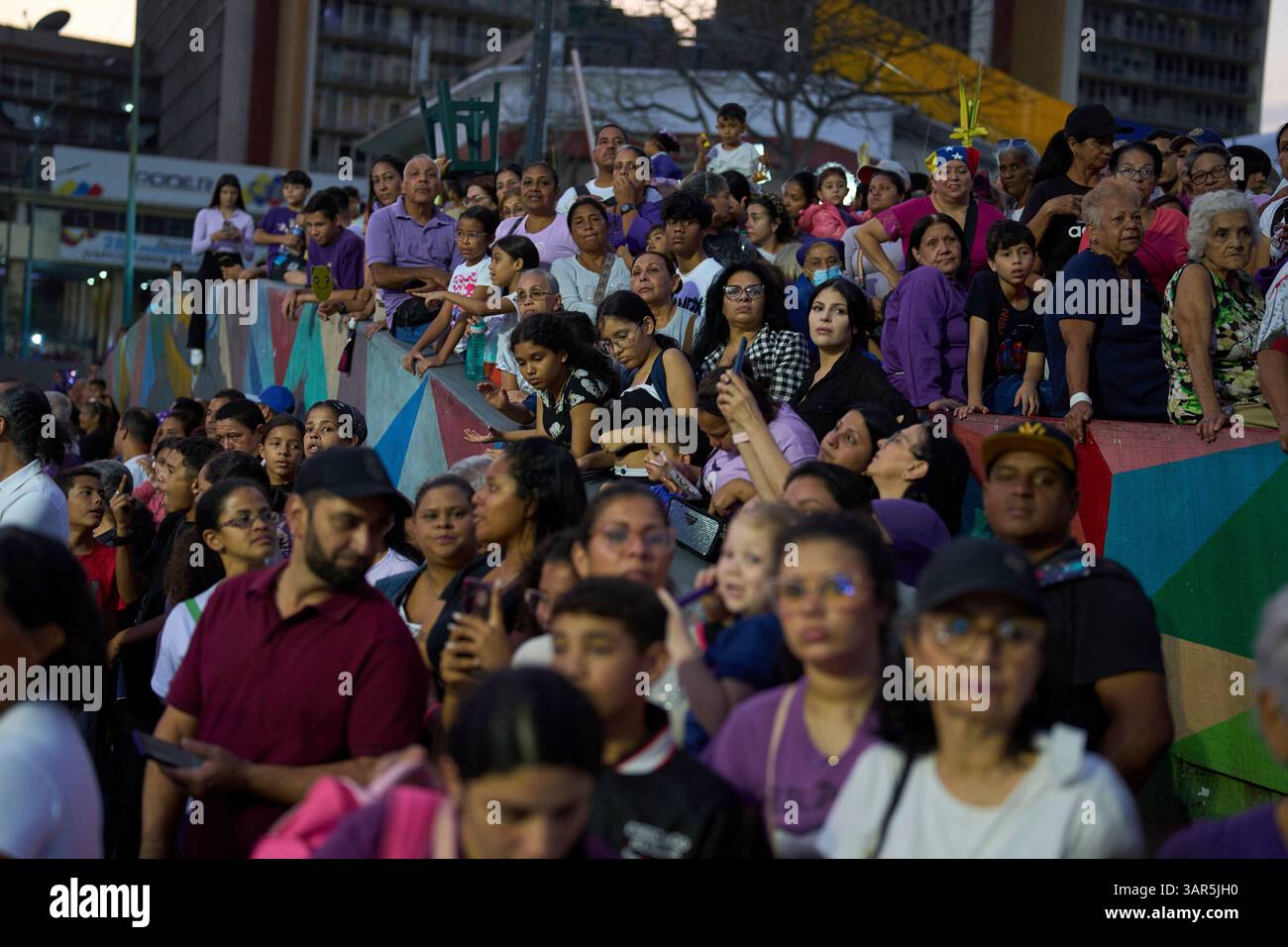 People watch the Nazarene of Saint Paul Holy Week procession in Caracas ...