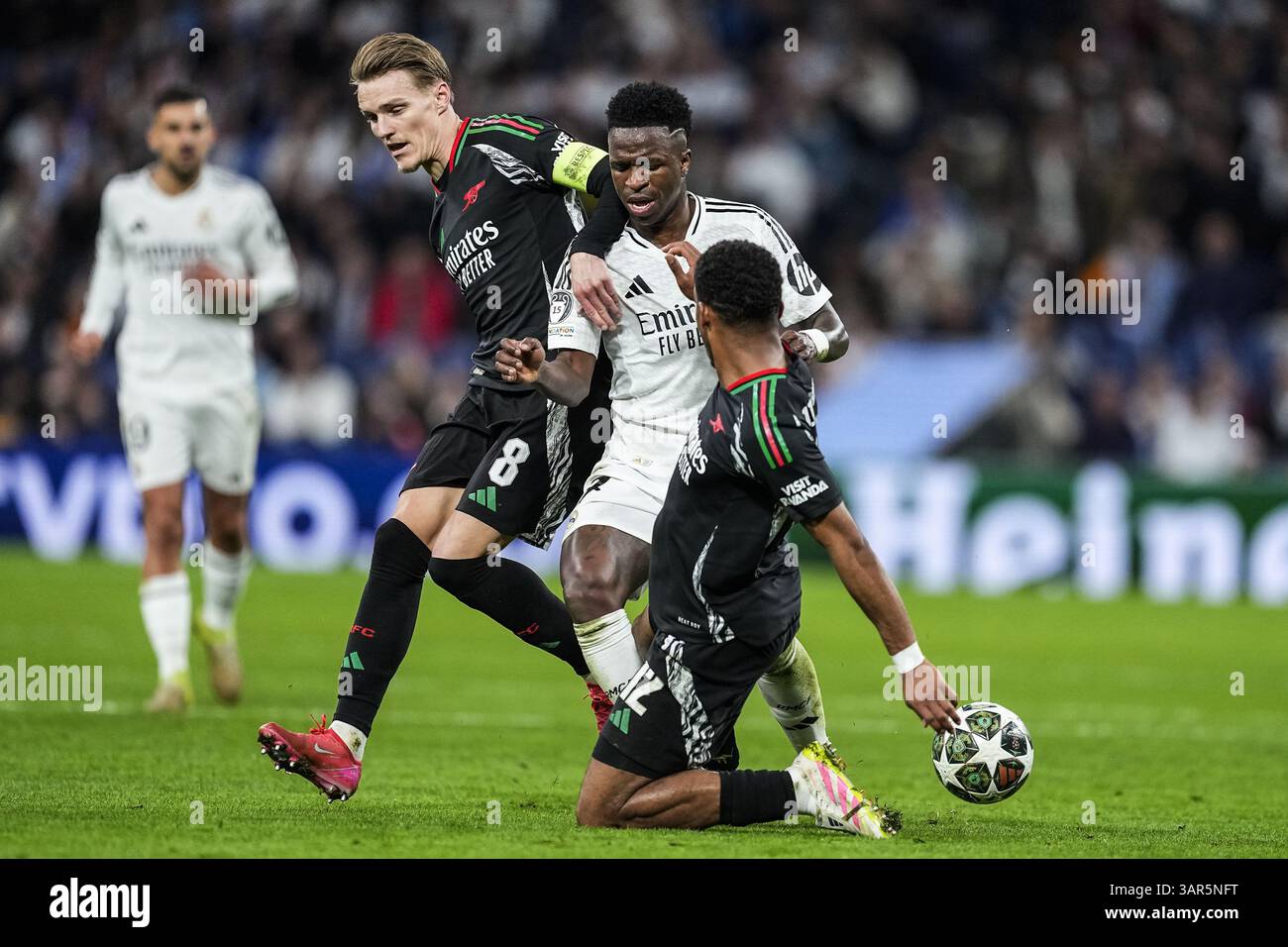 Vinicius Junior of Real Madrid and Martin Odegaard, Jurrien Timber of ...