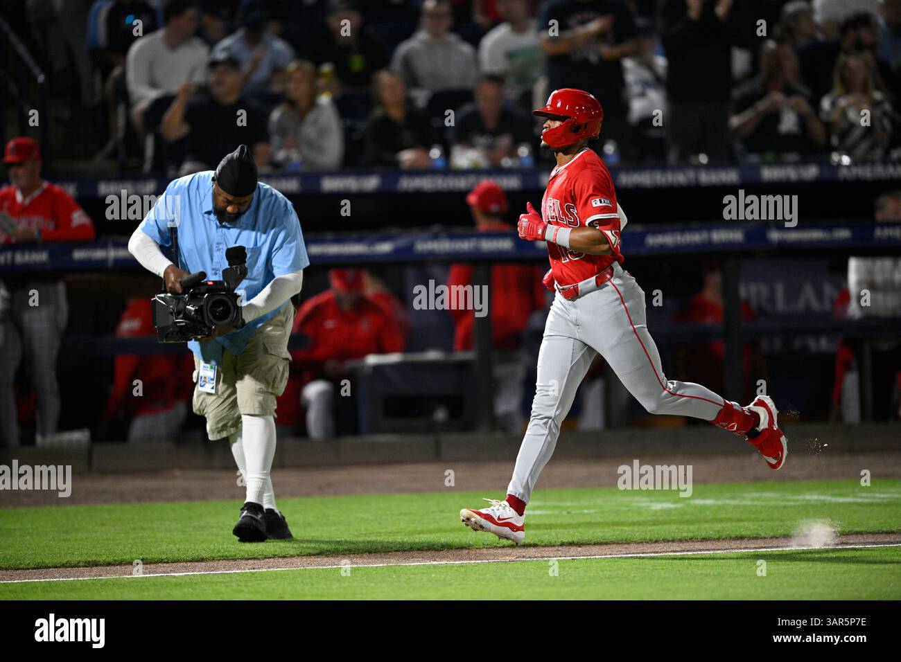 Los Angeles Angels' Kyren Paris (19) heads to home plate following his ...