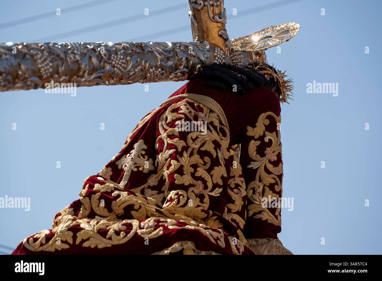 A statue of Jesus of Nazareth wears a tunic created by weavers at the ...