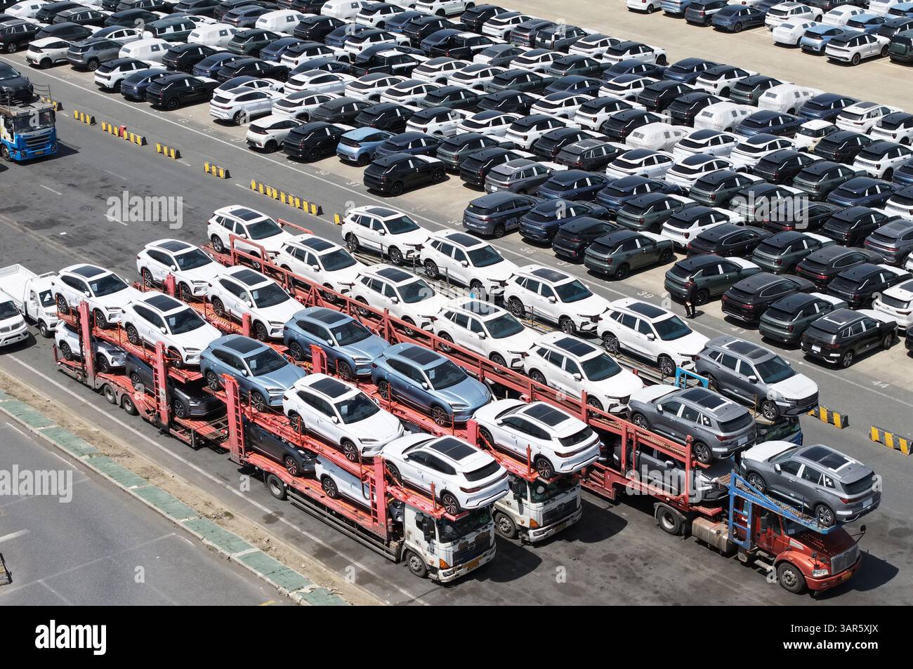 An aerial photo shows a large number of new energy vehicles waiting for ...