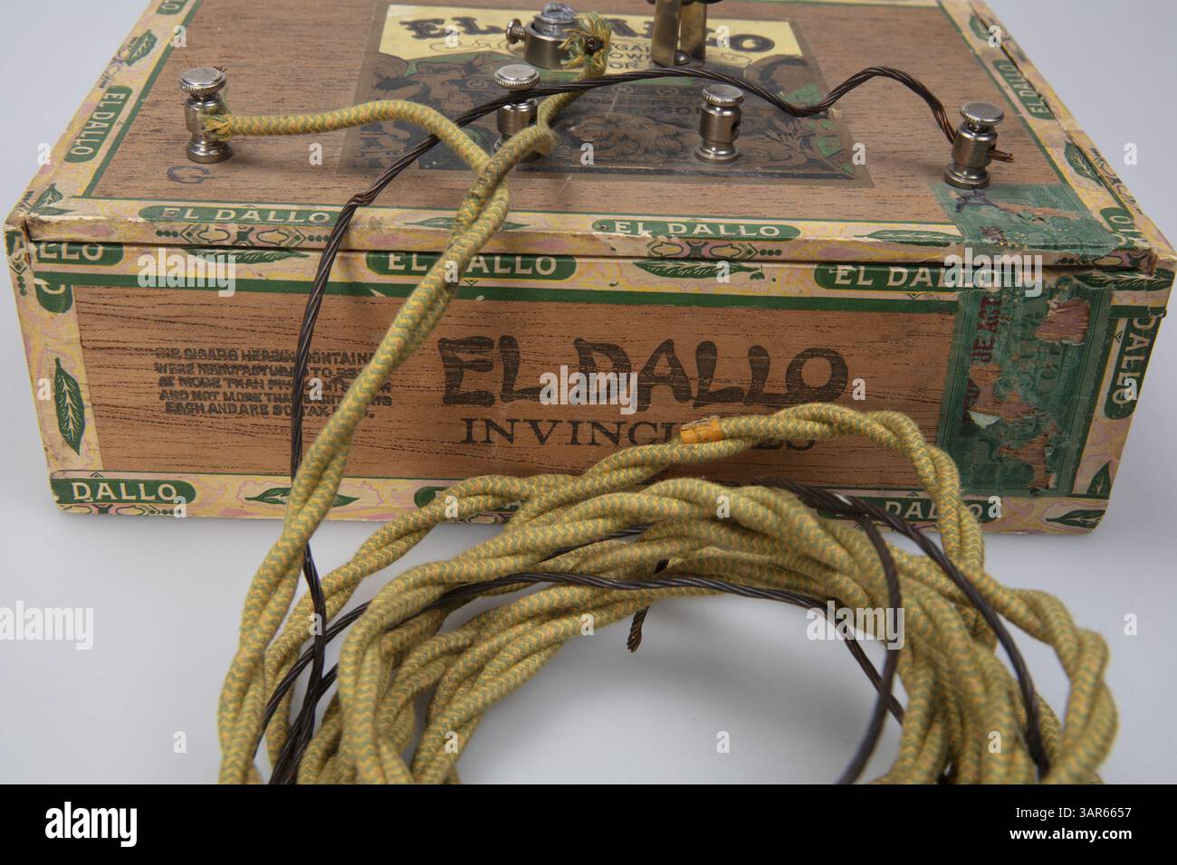 A homemade cigar box crystal radio set created by 12-year-old Thomas ...