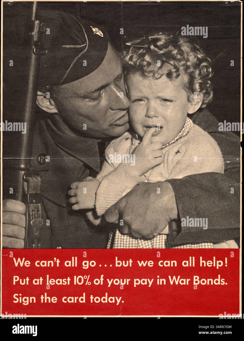 This photograph features an American soldier holding his rifle while ...