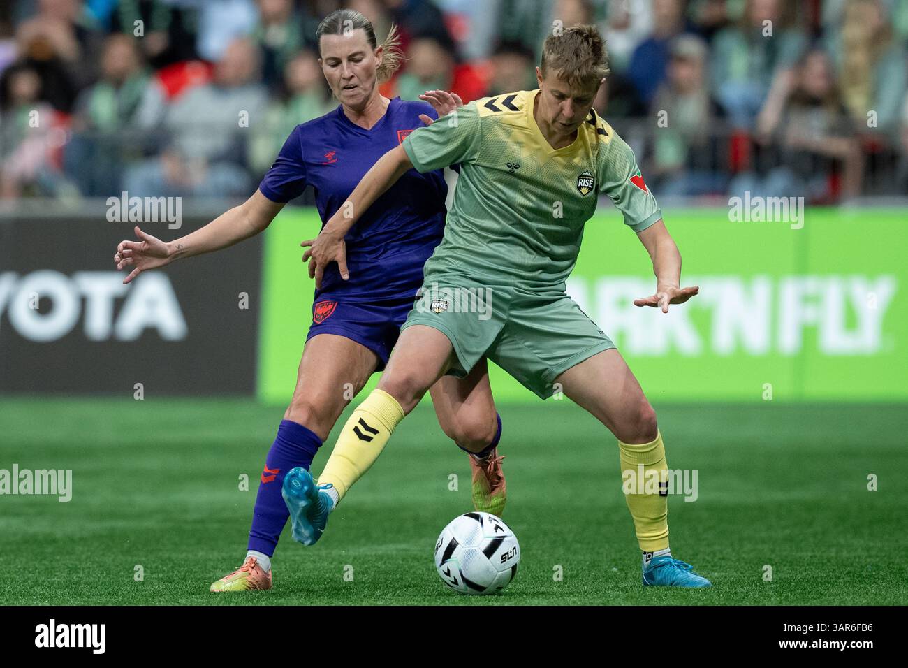 Vancouver, Canada. 16th Apr, 2025. Calgary Wild's Ally Green, left, and ...