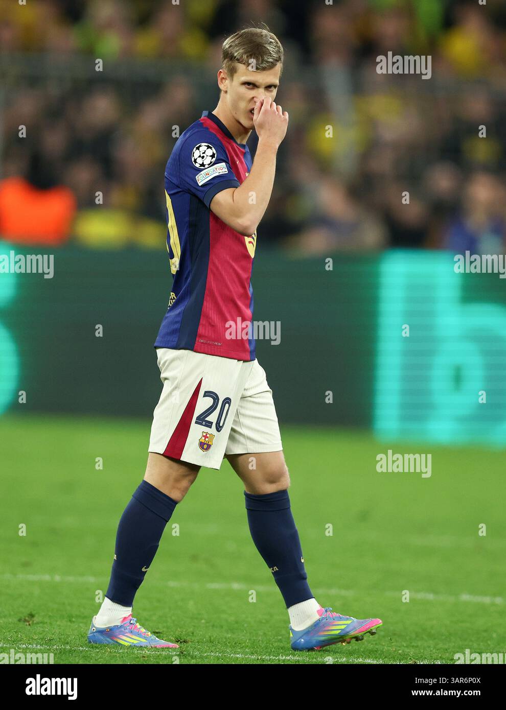 DORTMUND, GERMANY - APRIL 15: Dani Olmo of FC Barcelona reacts during ...