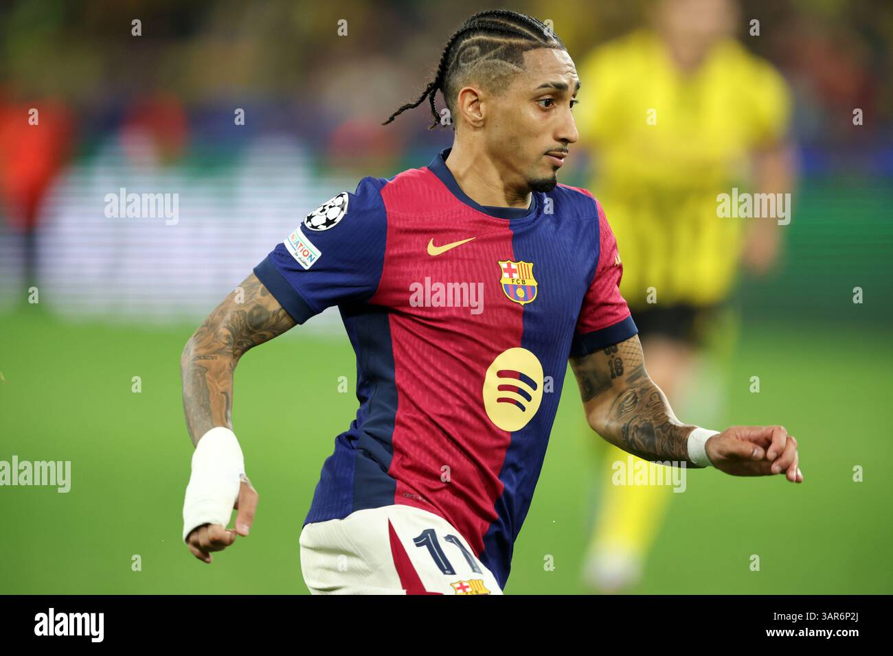 DORTMUND, GERMANY - APRIL 15: Raphinha of FC Barcelona in action during ...