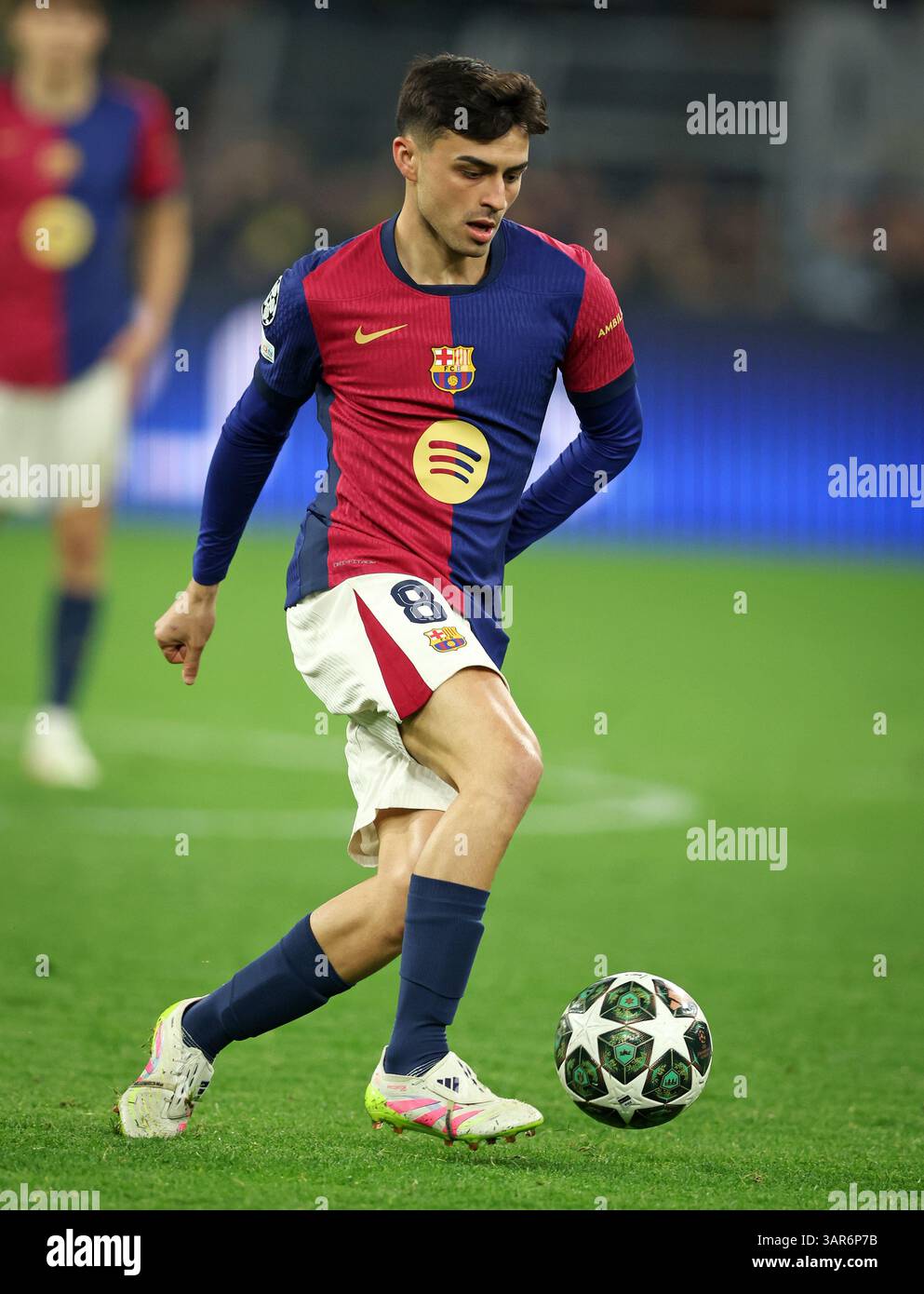 DORTMUND, GERMANY - APRIL 15: Pedri of FC Barcelona runs with a ball ...