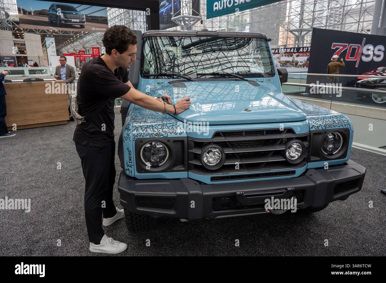 NEW YORK, NEW YORK - APRIL 16: Alex Alpert decorates an INEOS Grenadier ...